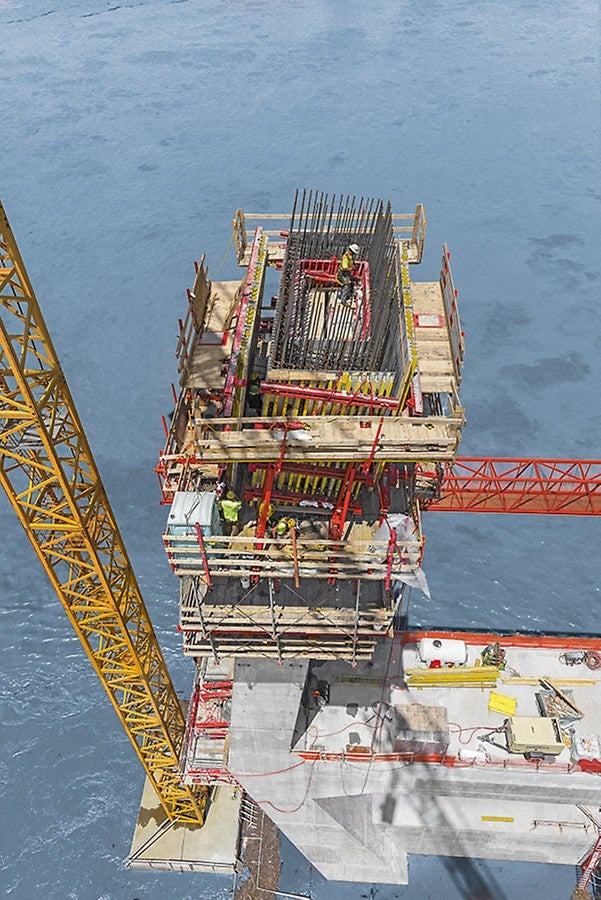 Climbing formwork and shoring solution for complex bridge pylons